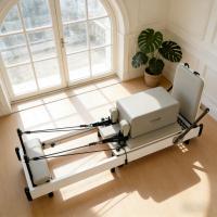 China Custom Logo Foldable Pilates Reformer Wood 2370mm with Adjustable Springs for Body Building for sale