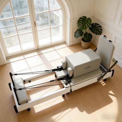 China Custom Logo Foldable Pilates Reformer Wood 2370mm with Adjustable Springs for Body Building for sale