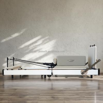 China Training Exercise Maple Folding Reformer Durable Wood Foldable Pilates Reformer for sale