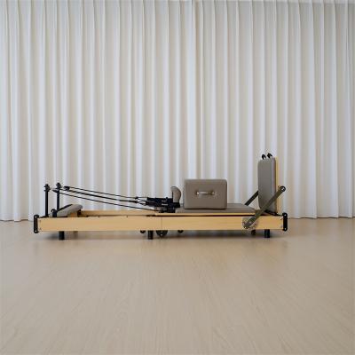 China Eco Friendly Foldable Wooden Pilates Reformer 237x61x28cm for Home Gym Space Saving for sale