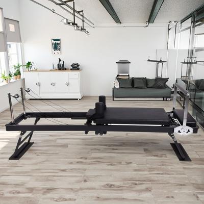 China Foldable Pilates Machine ABS Steel Yoga Training Bed Core Rollers Home Fitness 197x57.5x72.5cm for sale