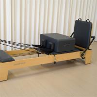 China Commercial Adjustable Multifunctional Pilates Reformer Training Bed Beech Wood for sale