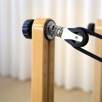 China Commercial Adjustable Multifunctional Pilates Reformer Training Bed Beech Wood for sale