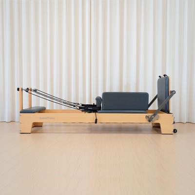 China Commercial Studio Beech Wood Pilates Reformer Bed 2250x630x300mm Fitness Center for sale