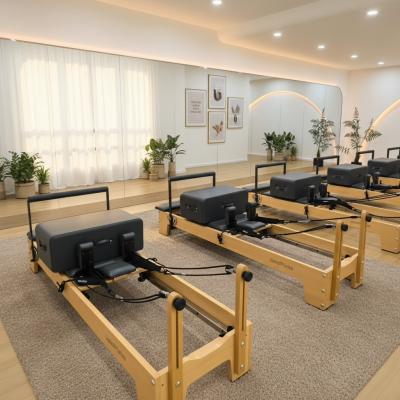 China Commercial Pilates Reformer Maple Wood 2250x630x300mm Portable Body Training Equipment for sale