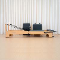 China Professional Wood Pilates Reformer 2250x630x300mm with Spine Corrector and Full Trapeze for Yoga Gym Studio for sale