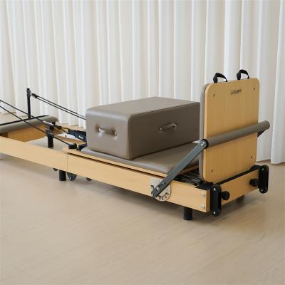 China Foldable Wood Pilates Reformer 237x61x28cm Portable Home Eco Friendly Professional Fitness Equipment for sale