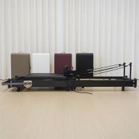 China Luxury Foldable Wooden Pilates Reformer 237x61x28cm Portable Gym Equipment Beige for sale