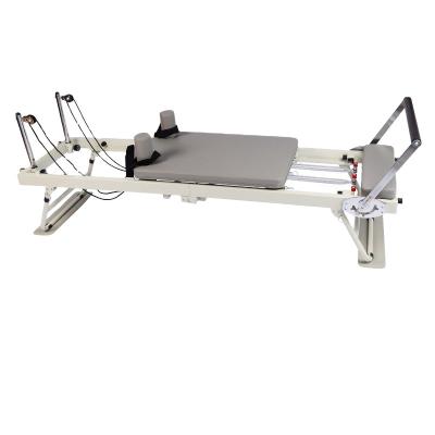 China Foldable Pilates Cadillac Reformer with Sliding Track 220cm Steel Frame Home Gym Equipment for sale