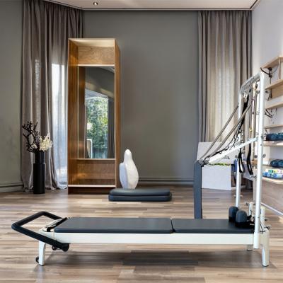 China Multifunction Adjustable Metal Tower Aluminum Reformer Pilates Reformer Universal for sale