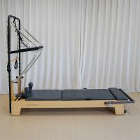 China Custom Wood Pilates Reformer With Tower For Studio Core Bed With Half Trapeze for sale
