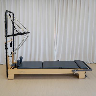 China Custom Wood Pilates Reformer With Tower For Studio Core Bed With Half Trapeze for sale