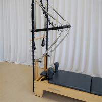 China Custom Wood Pilates Reformer With Tower For Studio Core Bed With Half Trapeze for sale