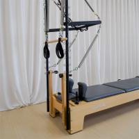 China Custom Wood Pilates Reformer With Tower For Studio Core Bed With Half Trapeze for sale