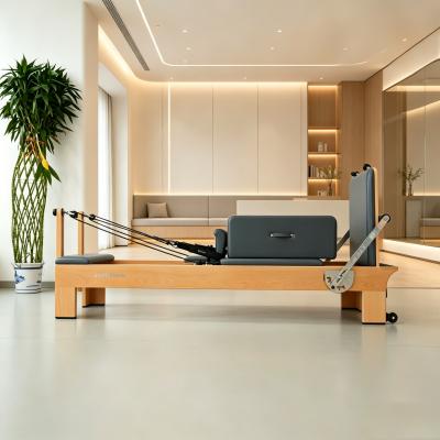 China Jaalee Portable Beech Wood Pilates Reformer 2540x680x400mm Custom Logo OEM ODM for sale
