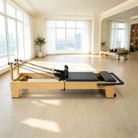 China Wooden Pilates Reformer Training Equipment Multifunction Portable Pilates Studio with 3 Year Warranty for sale