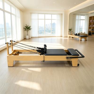 China Wooden Pilates Reformer Training Equipment Multifunction Portable Pilates Studio with 3 Year Warranty for sale