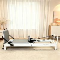 China Beech Wood Pilates Reformer 2250x630x300mm Durable Core Workout Equipment with Sliding Body Bed for sale