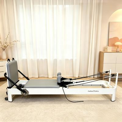 China Beech Wood Pilates Reformer 2250x630x300mm Durable Core Workout Equipment with Sliding Body Bed for sale
