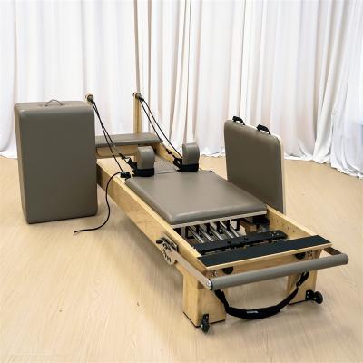 China Portable Maple Wood Pilates Equipment with Mat for Studio and Body Pilates Machine 2480x680x350mm for sale