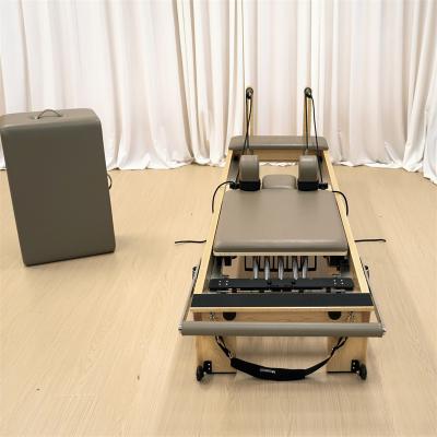 China Portable Wood Pilates Reformer 2480x680x350mm with Maple Wood Accessories for Studio Gym for sale