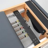 China Custom Eco Friendly Beech Wood Pilates Reformer 2480x680x350mm Yoga Studio Machine for sale