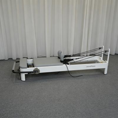 China Portable Pilates Studio Reformer Machine Beech Wood Oak Wood Multifunction for sale