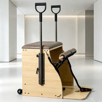China Maple Wood Pilates Wunda Chair 750x600x1100mm Spring Reformer for Studio Home Use for sale