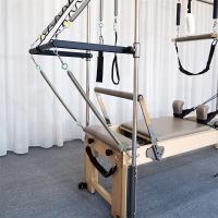 China Multifunctional Cadillac Reformer Machine Elevated Wood Bed Combo With Trapeze For Pilates for sale
