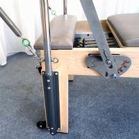 China Multifunctional Cadillac Reformer Machine Elevated Wood Bed Combo With Trapeze For Pilates for sale