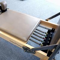 China Multifunctional Cadillac Reformer Machine Elevated Wood Bed Combo With Trapeze For Pilates for sale