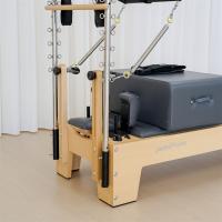 China Direct Factory Multi-layer Solid Wood Pilates Reformer With Half Tower Customizable Frame Surface Leather Logo Complete Matching Accessories for sale