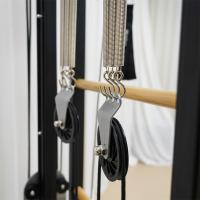China Solid Wood Pilates Reformer with Spiral Half Trapeze Tower Custom Frame Leather Color Logo Complete Accessories for sale