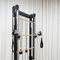 China Solid Wood Pilates Reformer with Spiral Half Trapeze Tower 304 Stainless Steel Hardware Custom Frame Color for sale