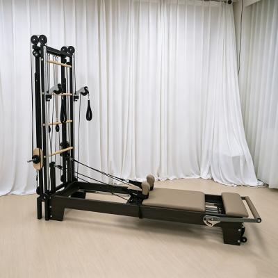 China Solid Wood Pilates Reformer with Spiral Half Trapeze Tower 304 Stainless Steel Hardware Custom Frame Color for sale
