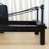 China Black Matte Aluminum Full Track Pilates Reformer with Full Accessories Professional Studio Core Bed for sale