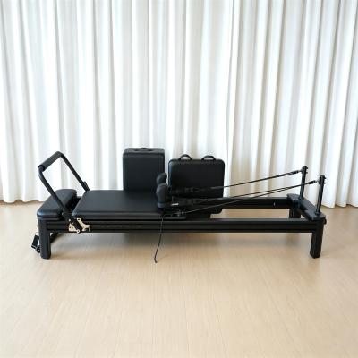 China Commercial Black Aluminium Pilates Reformer Full Sliding Track Core Training Bed With Box & Footrest for sale