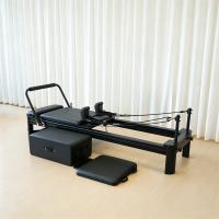 China Smooth Glide Full Track Black Aluminium Pilates Reformer Adjustable Core Workout Fitness Bed for sale
