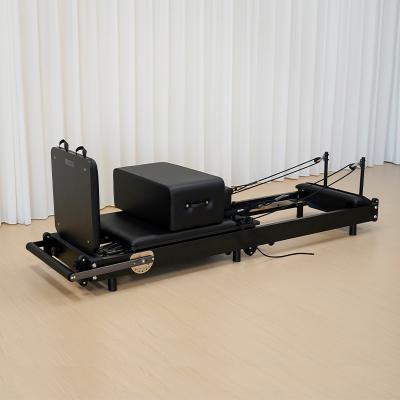 China Factory Direct Foldable Oak Wood Pilates Reformer Commercial Pilates Core Bed Custom Leather Color Wholesale Supply for sale