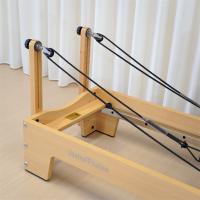 China Commercial Grade Wood Reformer Pilates Machine for Gyms with Durable and Customizable Design for sale