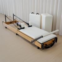China Lightweight Foldable Wood Pilates Reformer Compact Storage Pilates Core Bed Home Fitness Workout Equipment for sale