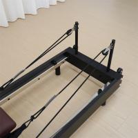China Solid Oak Foldable Wooden Pilates Reformer High Stability Pilates Training Bed Adjustable Resistance Springs for sale