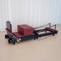 China A Grade Beech Wood Foldable Pilates Reformer Luxury Wooden Pilates Bed Customized Color For High End Studio for sale
