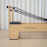 China Multi-Layer Solid Wood Pilates Reformer with Customizable Cushion Color and Durable Construction for Fitness Centers for sale