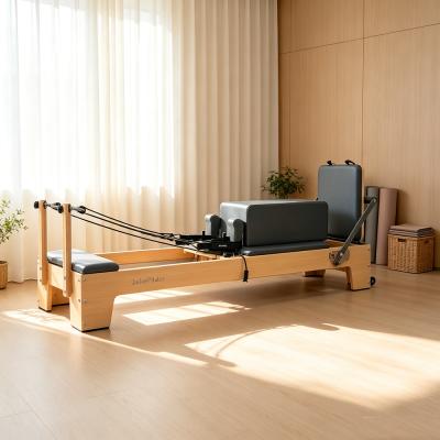 China High Quality Multi-Layer Solid Wood Pilates Core Bed Manufacturer, Customizable Cushion Color For Fitness Center Gym for sale