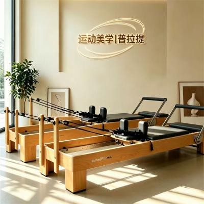 China Factory Direct Beech Wood Pilates Reformer Bed OEM ODM Customized Home Studio Pilates Core Bed for sale