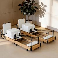 China Maple Wood Foldable Pilates Reformer Machine for Gym Studio Training With Box Smooth Carriage and Adjustable Footbar for sale
