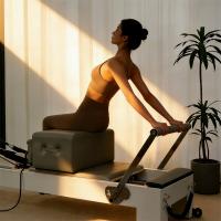 China Professional Yoga Beech Wood Pilates Core Reformer Bed Wooden Pilates Reformer Equipment Sliding Bed for Body Workout for sale