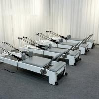 China Professional Yoga Beech Wood Pilates Core Reformer Bed Wooden Pilates Reformer Equipment Sliding Bed for Body Workout for sale