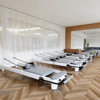 China Durable High Quality Pilates Reformer Adjusted Body Design Healthy Studio Commercial Beech Reformer Pilates Machine for sale